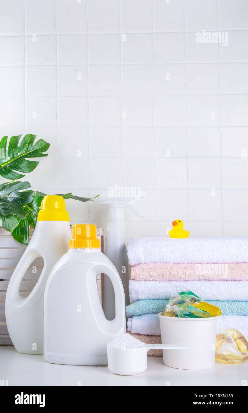 Laundry, washing and cleaning concept. Stack of clean towels, with ...