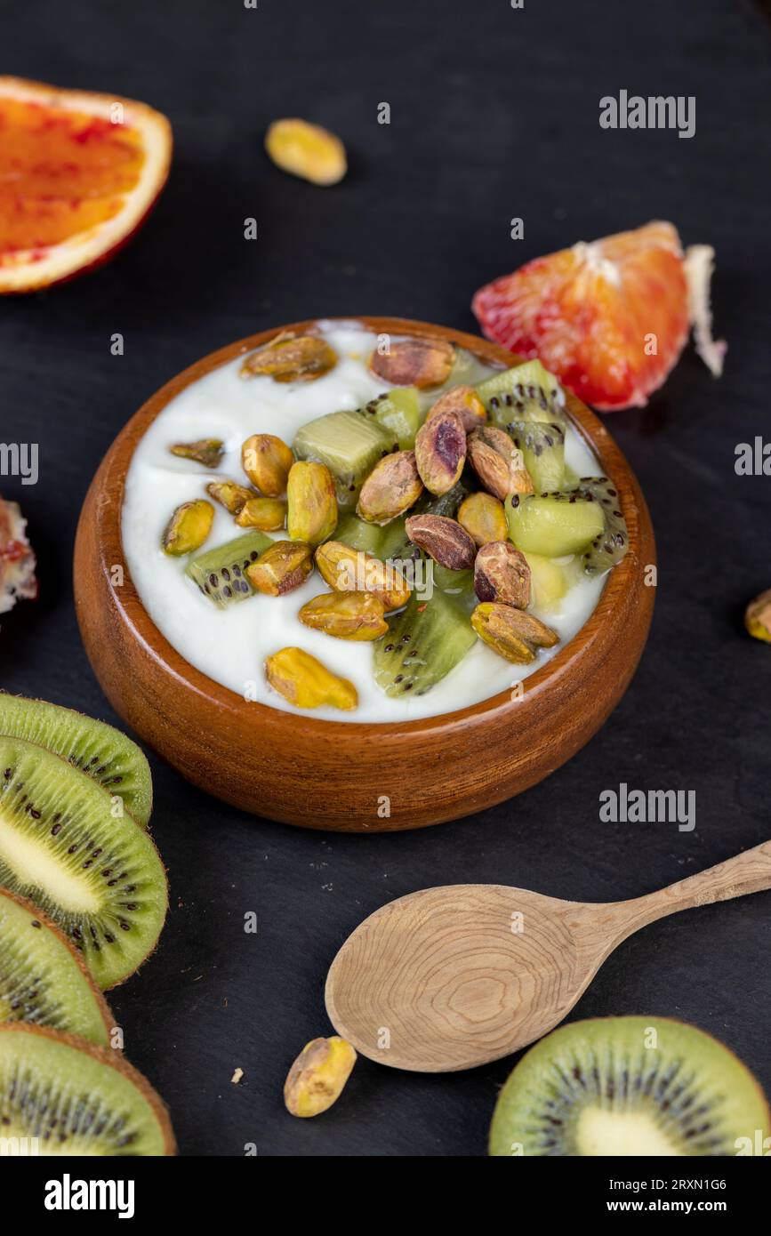 delicious green yogurt with fruit and berry flavor and pistachios ...