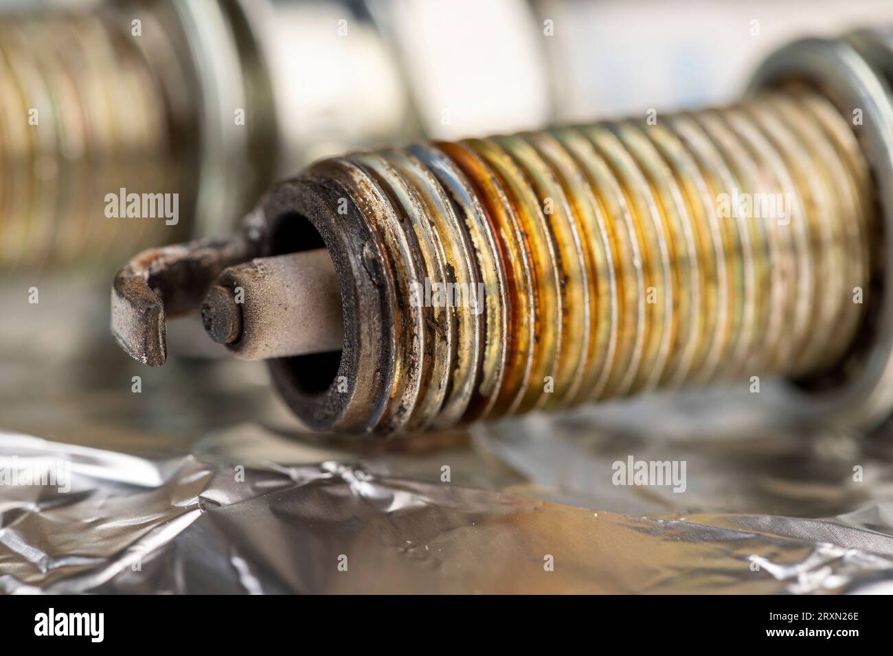 old very damaged car spark plugs, close-up of old used car spark plugs ...