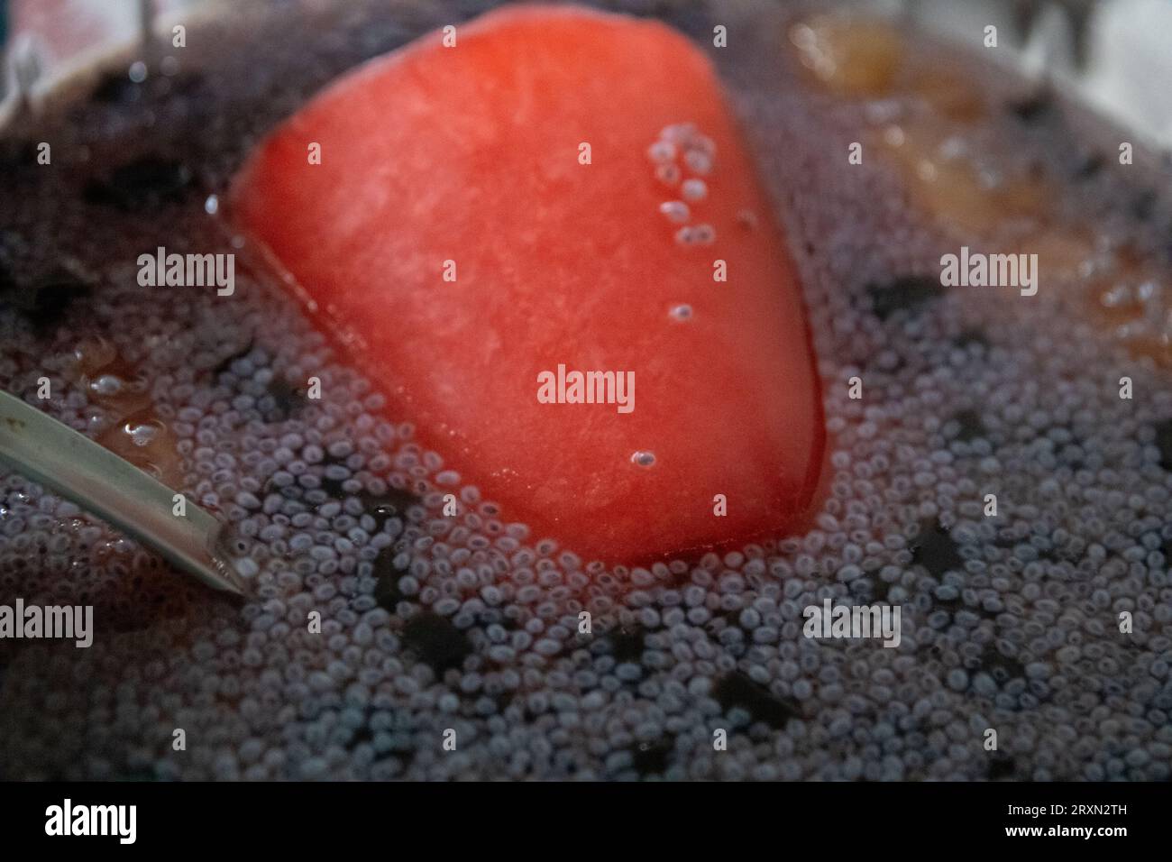 Rose syrup water with basil seeds Stock Photo - Alamy