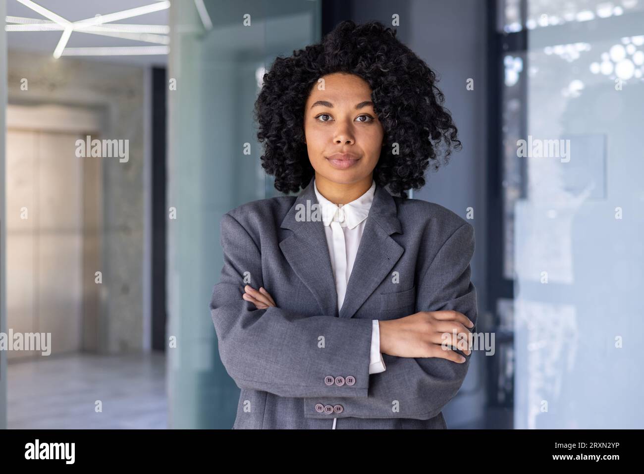 Portrait of serious successful African American business woman, boss in ...