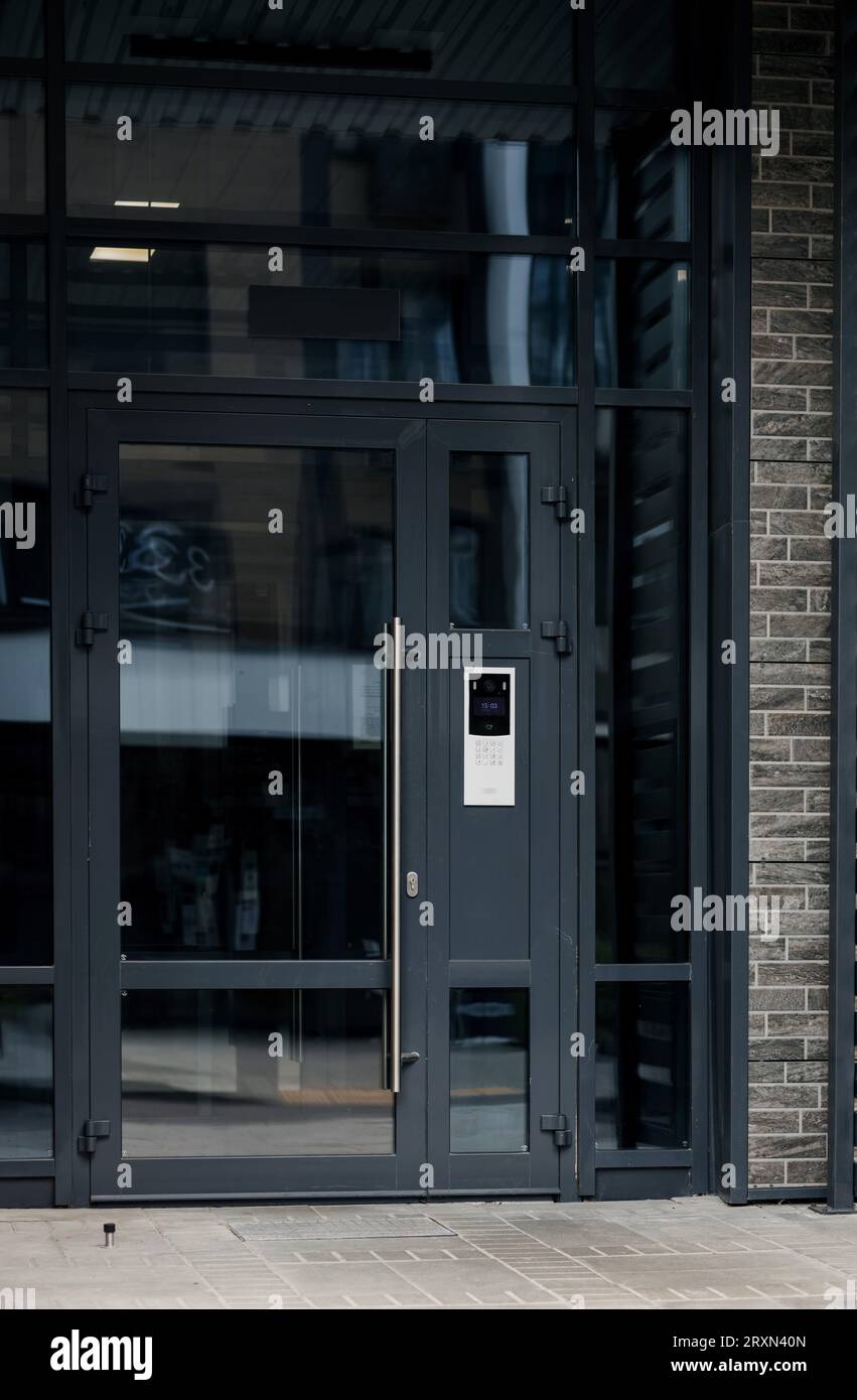 Intercom and security camera on wall outside residential building Stock ...