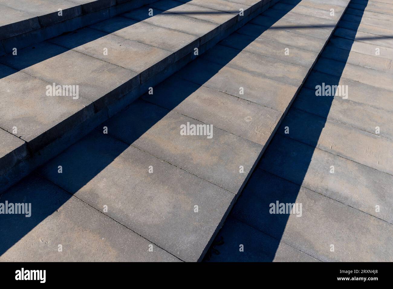 modern concrete staircase with long steps, close-up of a concrete ...