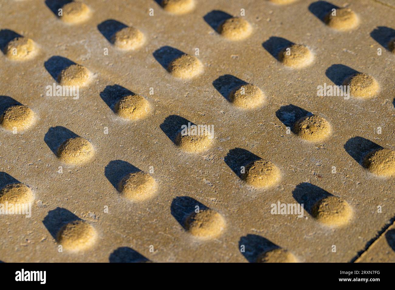 part of concrete anti-slip tiles with bulges, part of safe tiles on the ...