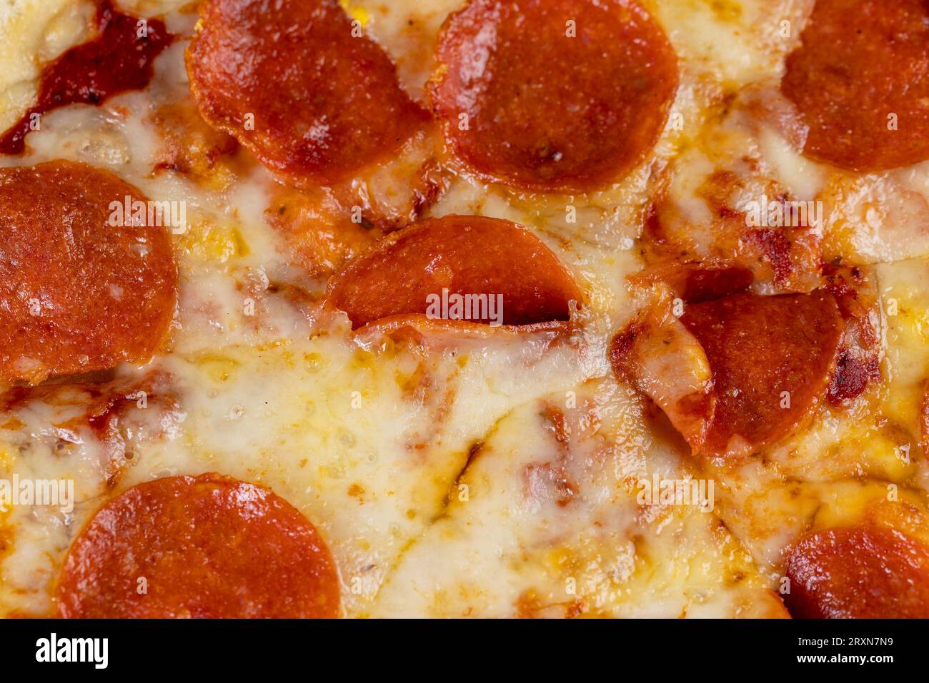 small homemade spicy pizza with sausage and cheese, chilled pizza of ...