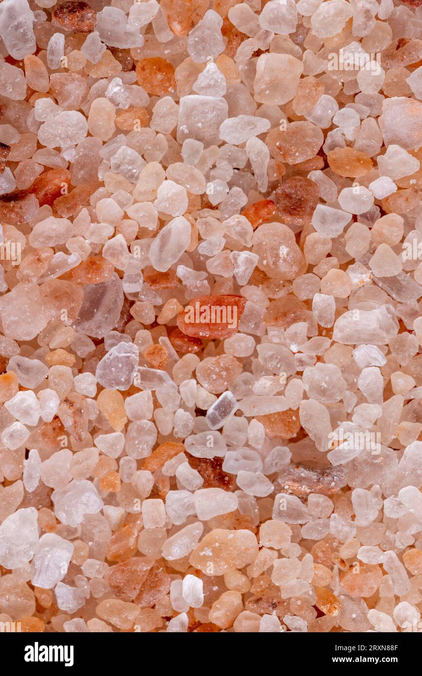 A large number of pink salt crystals of different sizes, a lot of pink ...