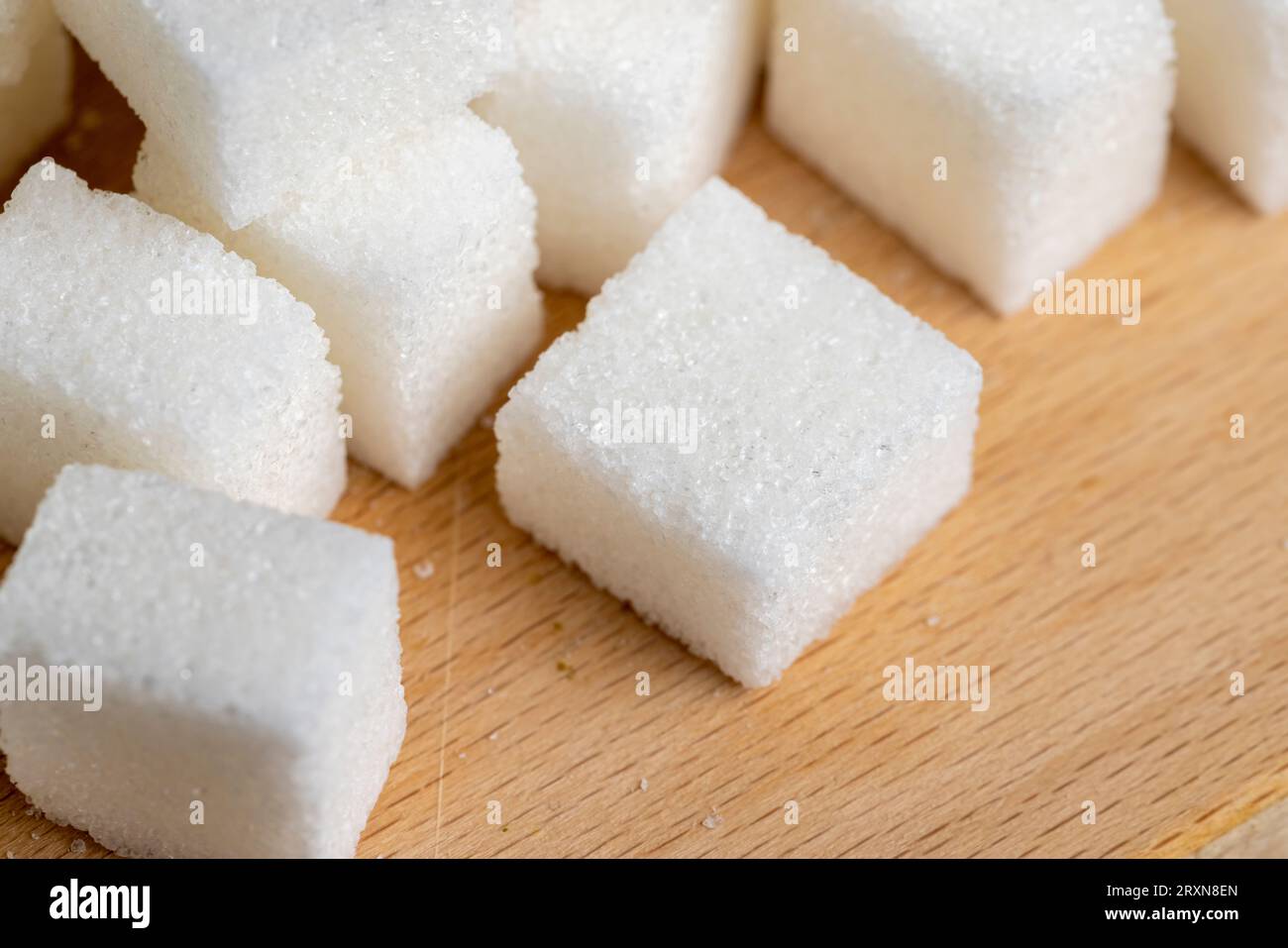 White sugar made from beetroot, cubes of white beet sugar close-up ...