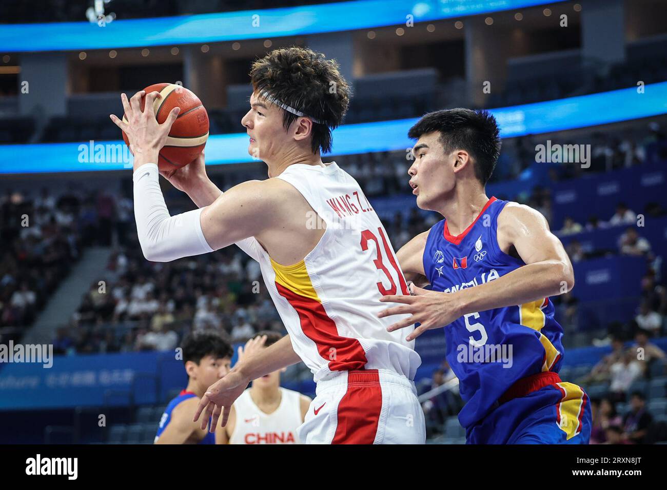 Hangzhou, China's Zhejiang Province. 26th Sep, 2023. Wang Zhelin (L) of ...