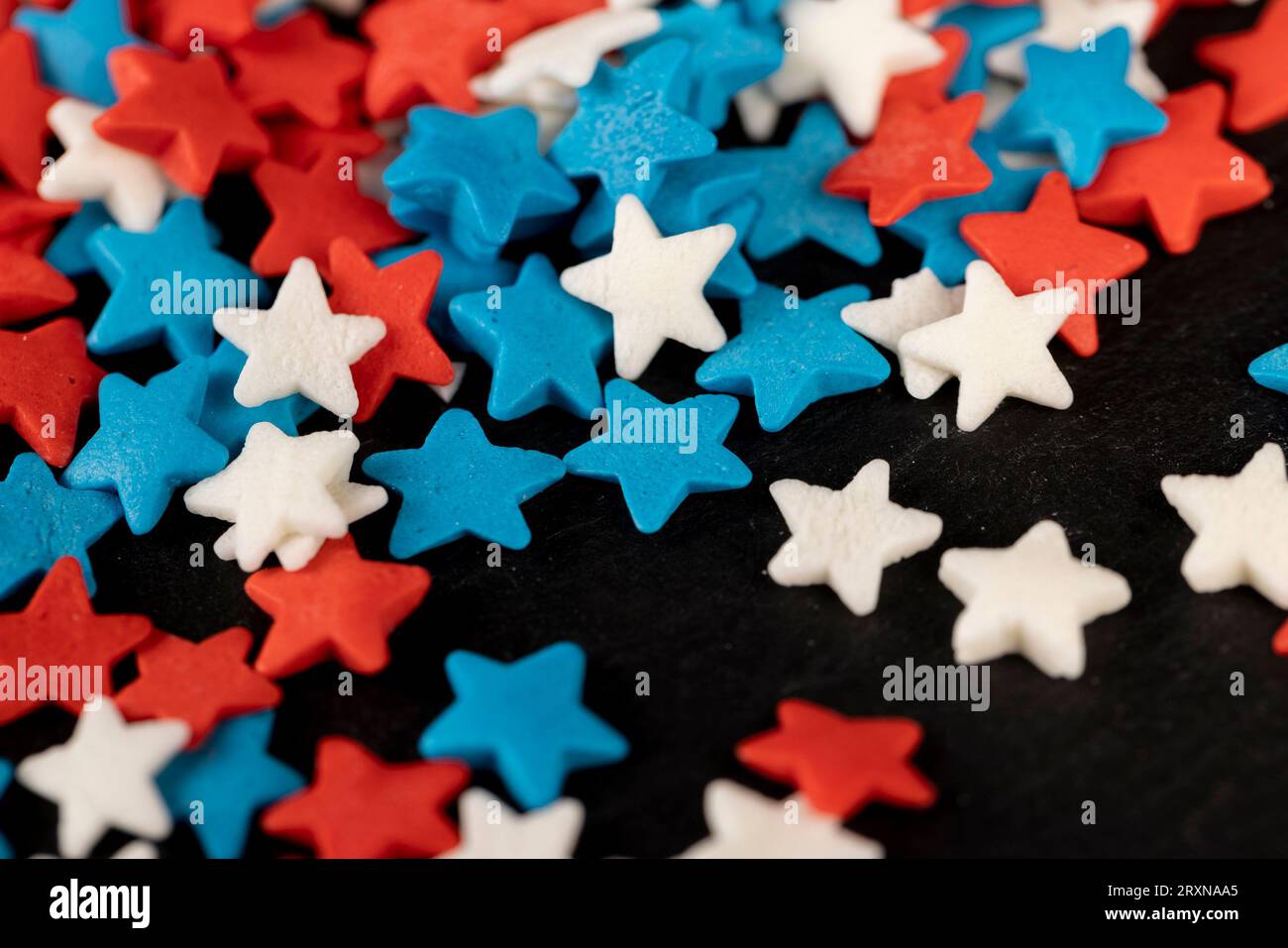 red, white and blue star-shaped candies for decorating cakes and other ...