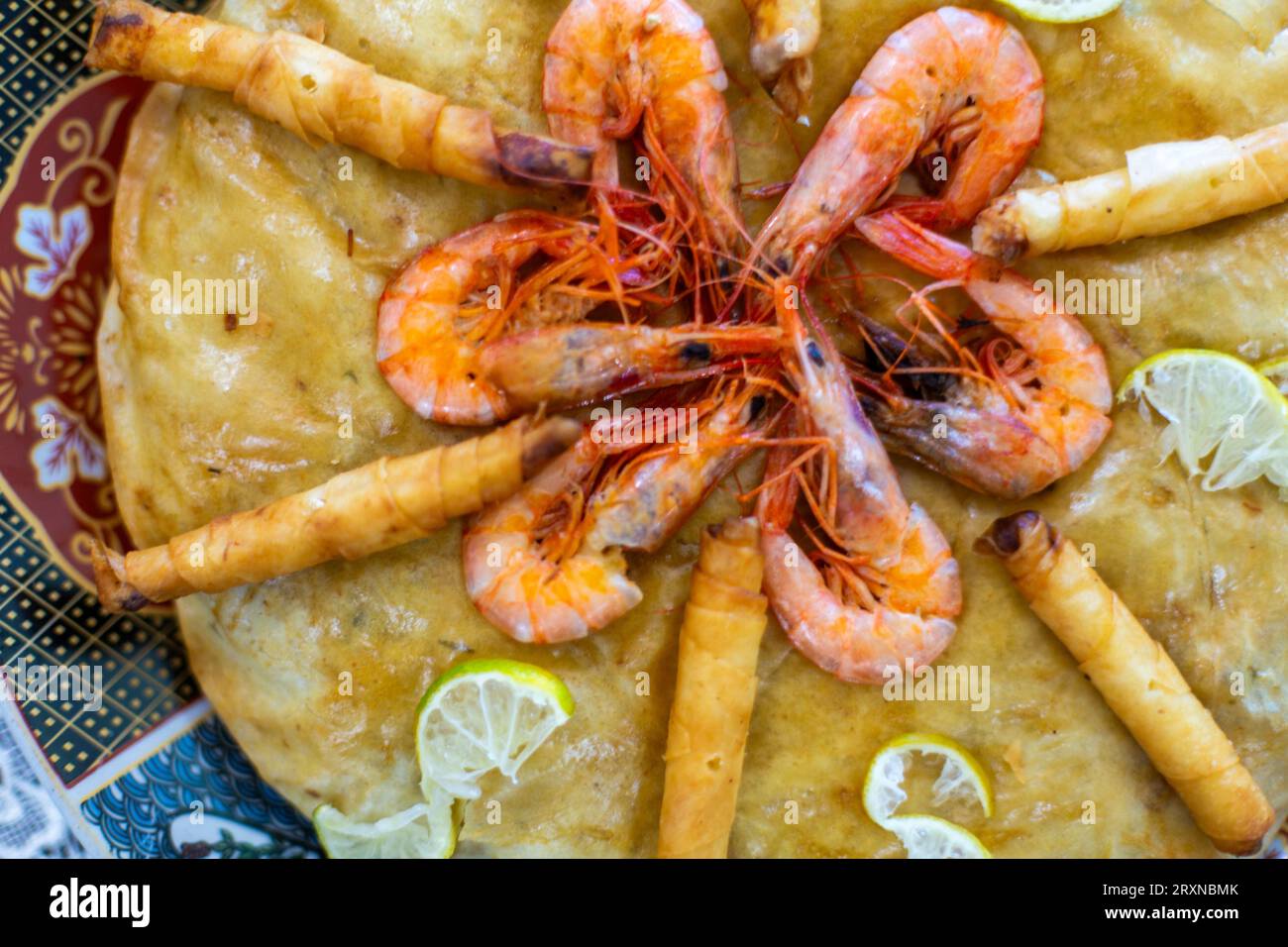 Traditional Moroccan pastilla with different seafood Stock Photo - Alamy