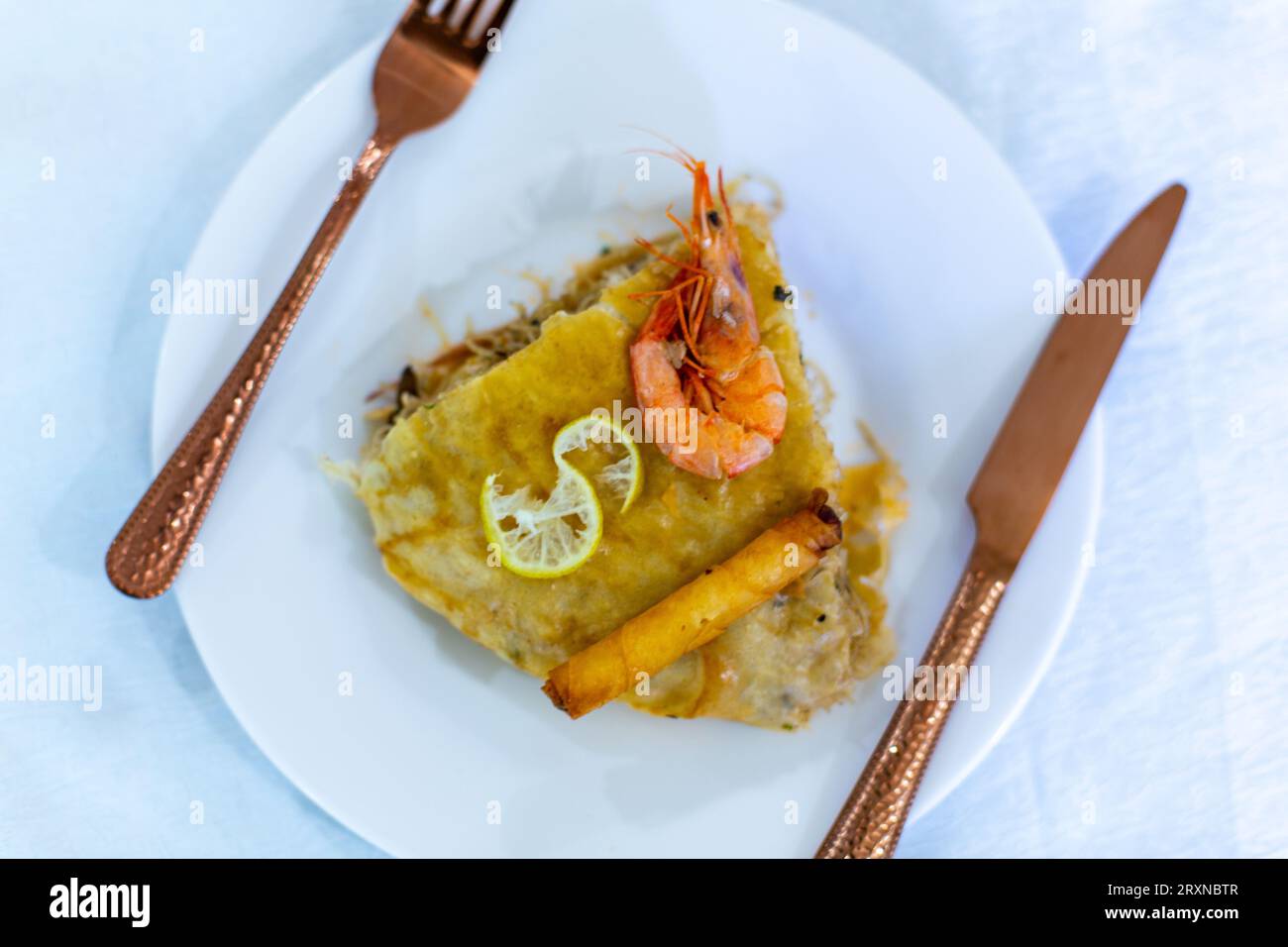 Traditional Moroccan pastilla with different seafood Stock Photo - Alamy