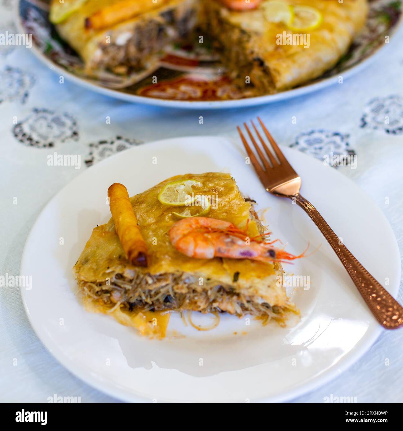 Traditional Moroccan pastilla with different seafood Stock Photo - Alamy
