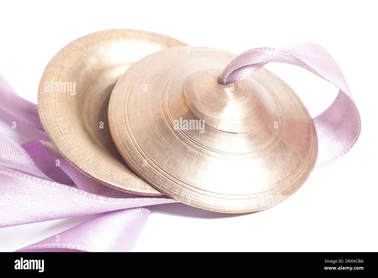 Hand cymbals isolated on white background Stock Photo - Alamy