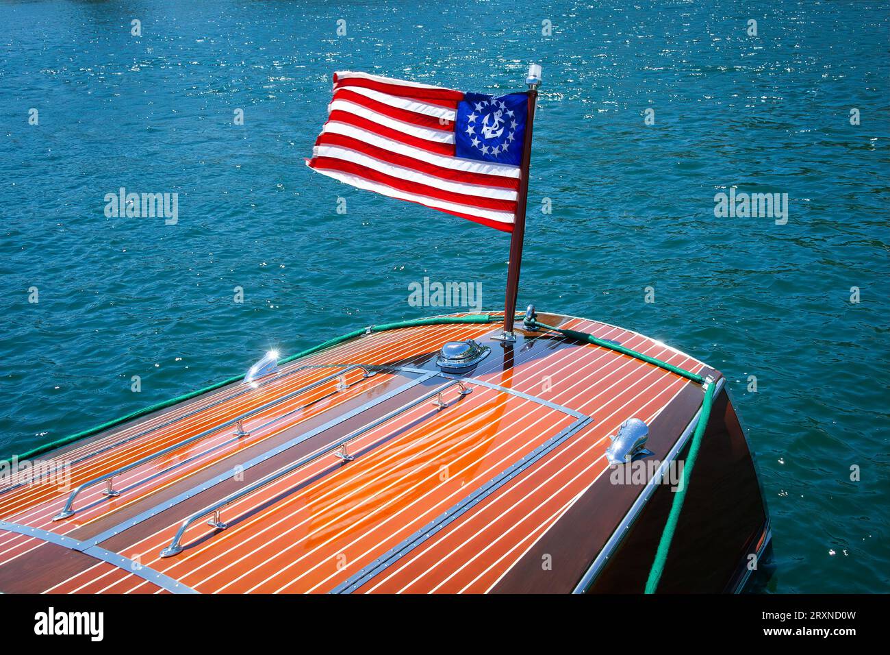 U.S. ensign at the stern of a classic 1930s mahogany Gar Wood runabout ...