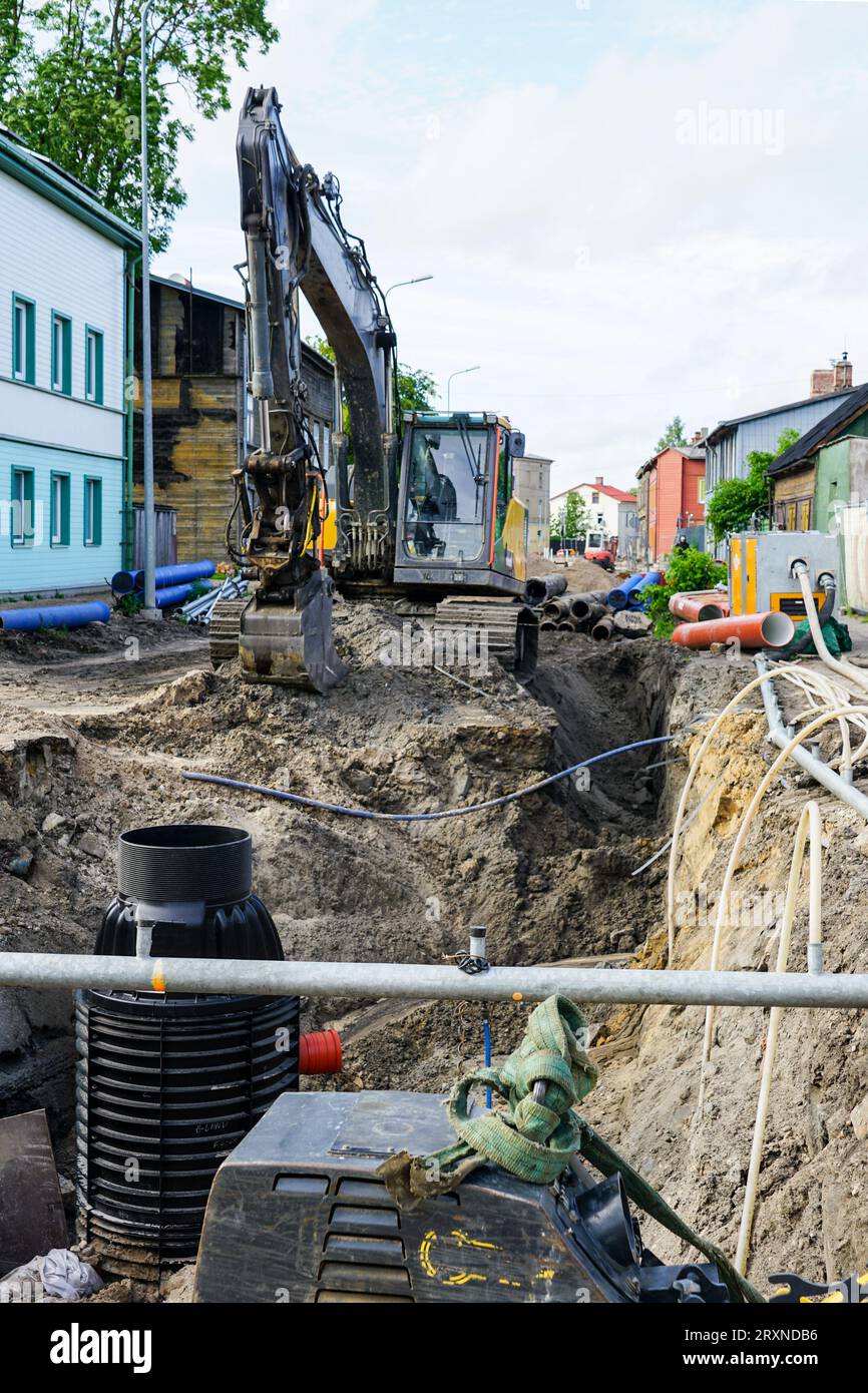 Street reconstruction view, deep trench, dewatering system, new and old ...