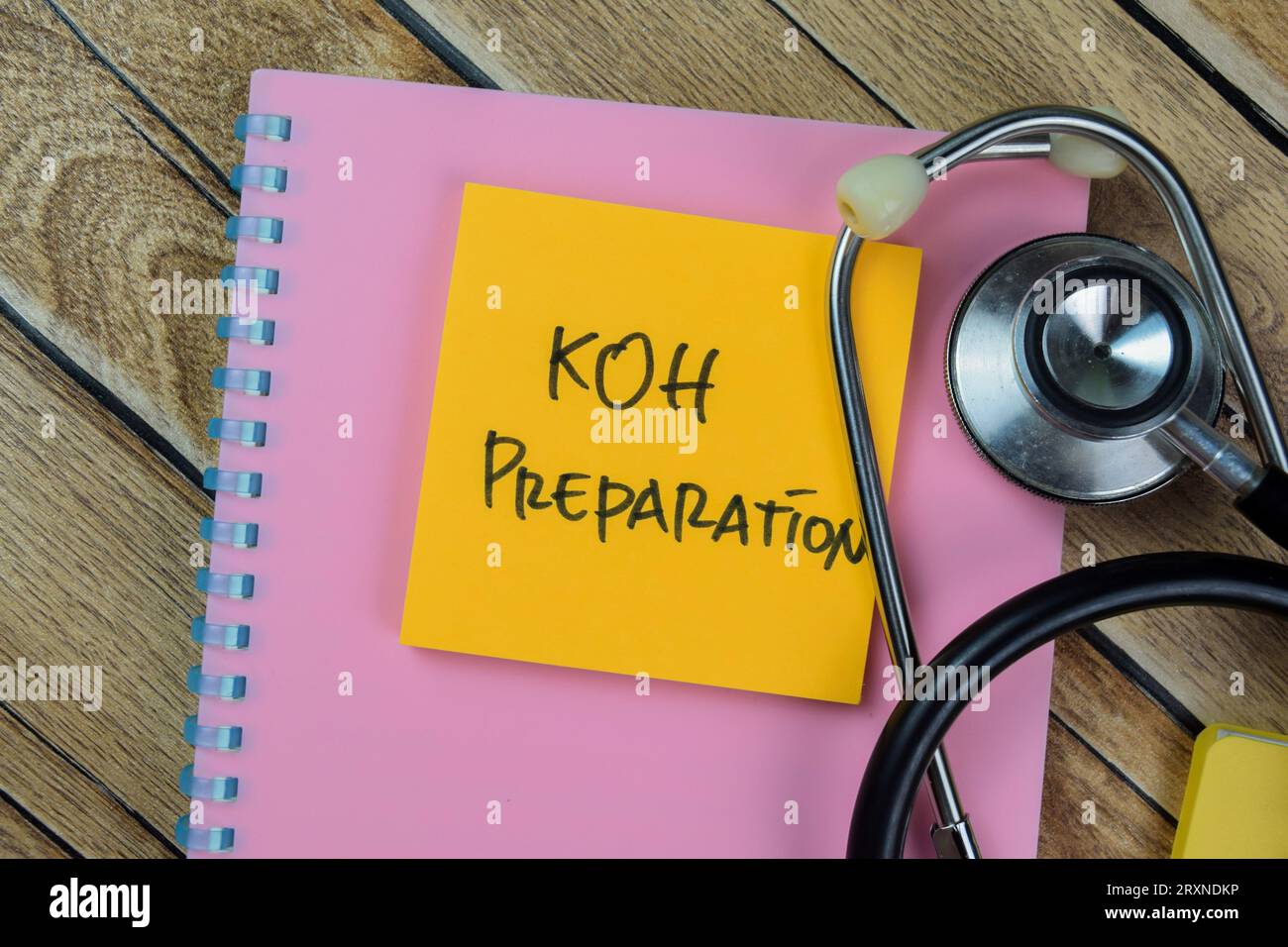 Concept of KOH Preparation write on sticky notes with stethoscope ...
