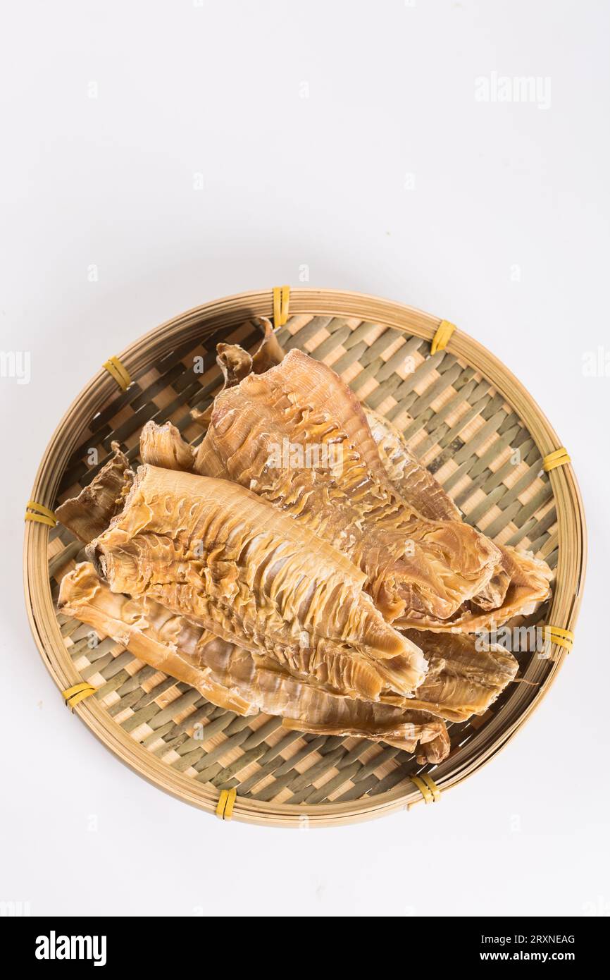 Dried bamboo shoots on a white background Stock Photo - Alamy