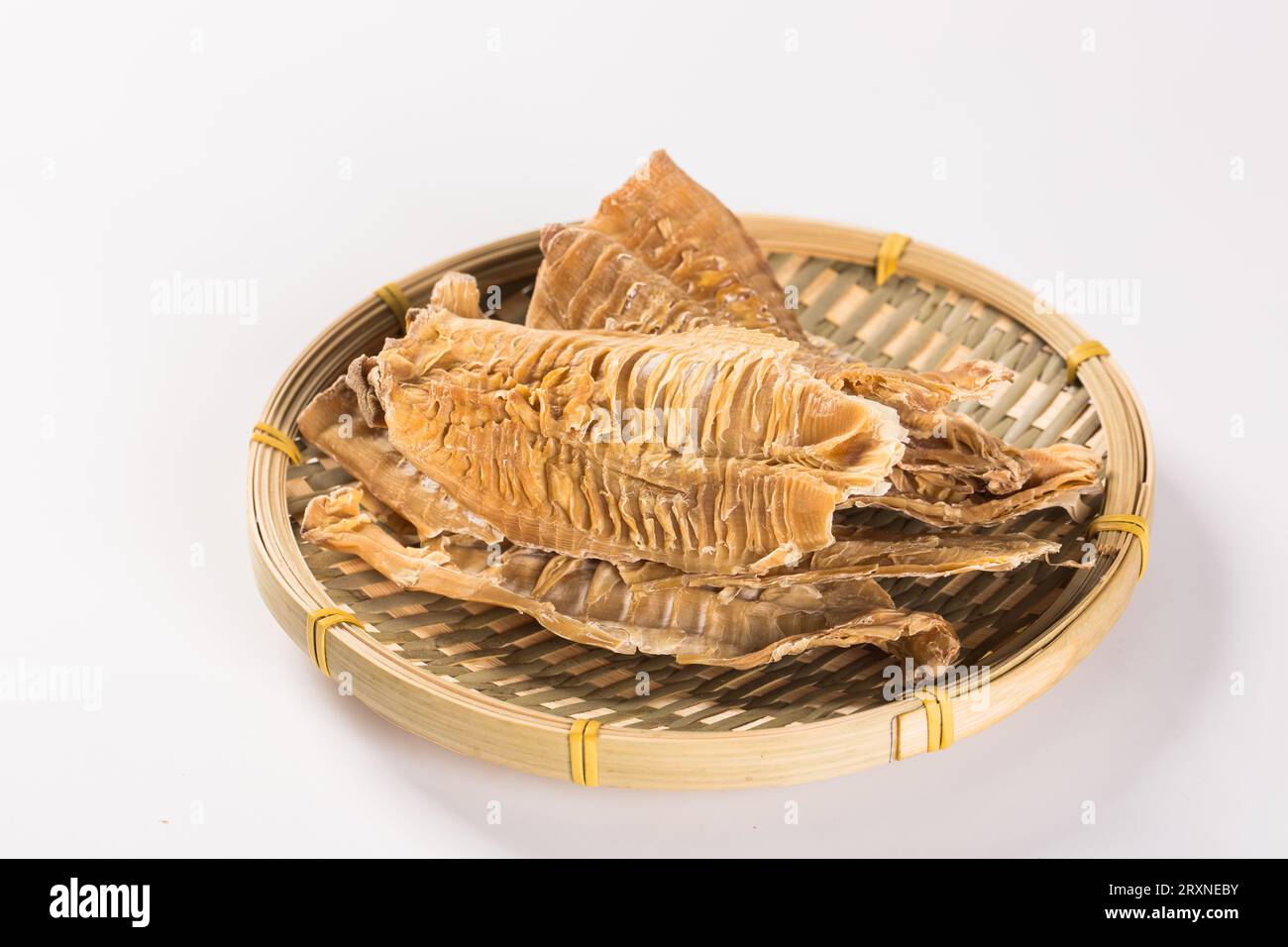 Dried bamboo shoots on a white background Stock Photo - Alamy