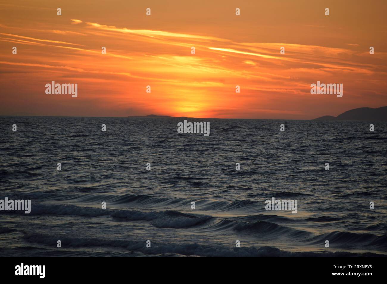 Sunset from Lambi beach on the greek island of Kos Stock Photo - Alamy