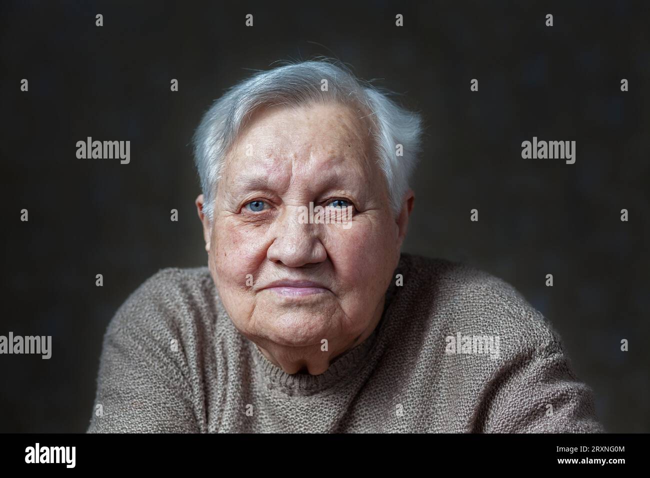 Portrait of an elderly, smile woman in the studio Stock Photo - Alamy