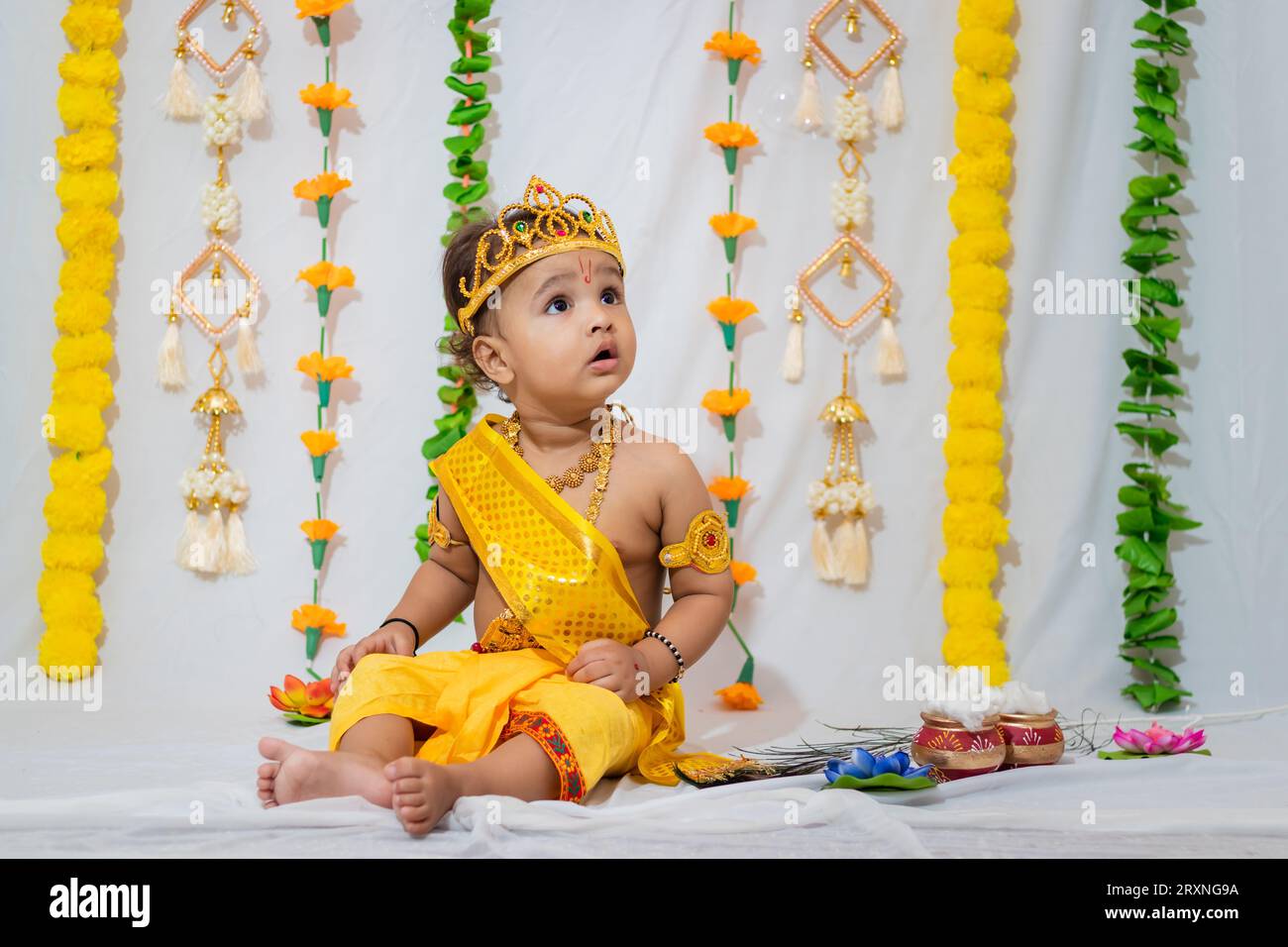 adorable infant dressed as hindu god krishna on the occasion of ...