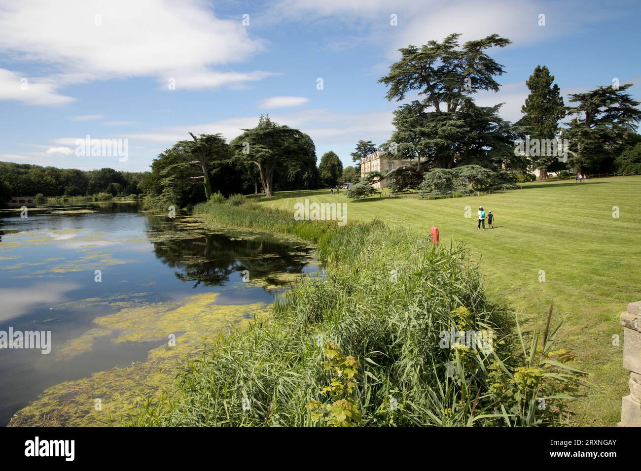 Mother and child wal;king in stunning parland at Compton Verney 18th ...