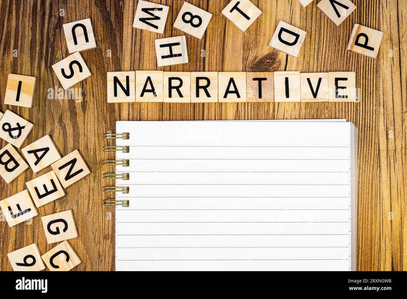 Narrative flat lay made of laser-engraved letters on blank line ...