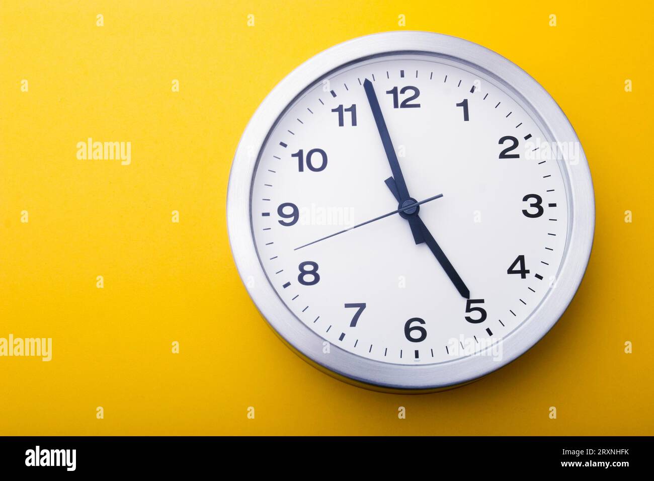The clock is almost five Stock Photo - Alamy