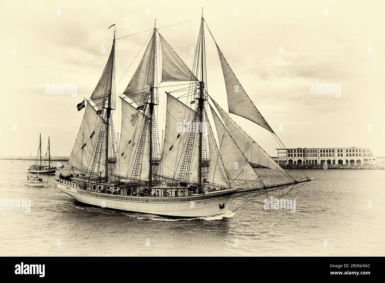 Three-masted sailing barque arrives in Warnemuende harbour Stock Photo ...