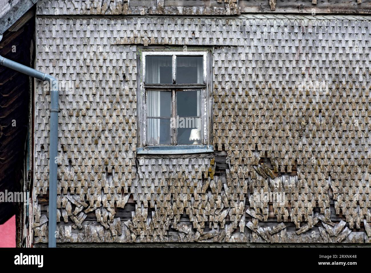 Dilapidated historic dwelling house, run-down, dilapidated, window with ...