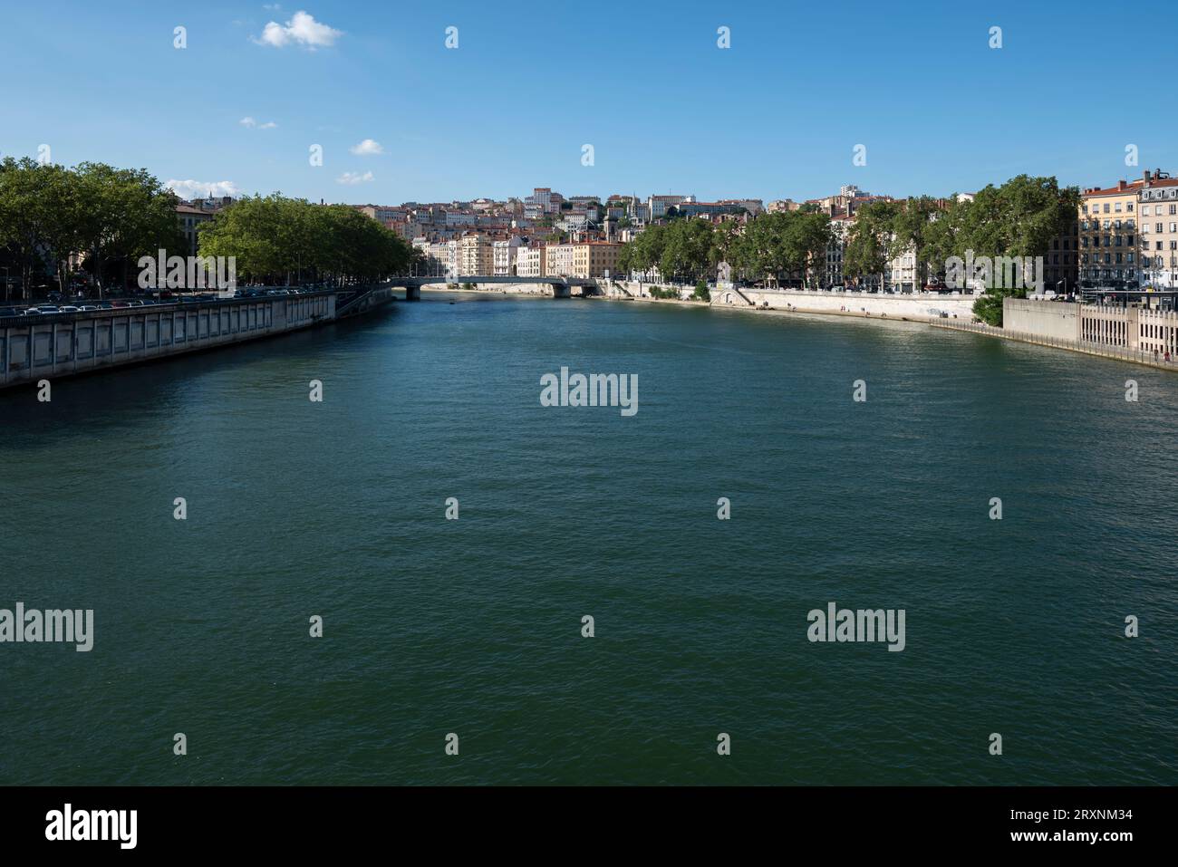 The Saône River with the Croix-Rousse neighborhood of Lyon in the ...