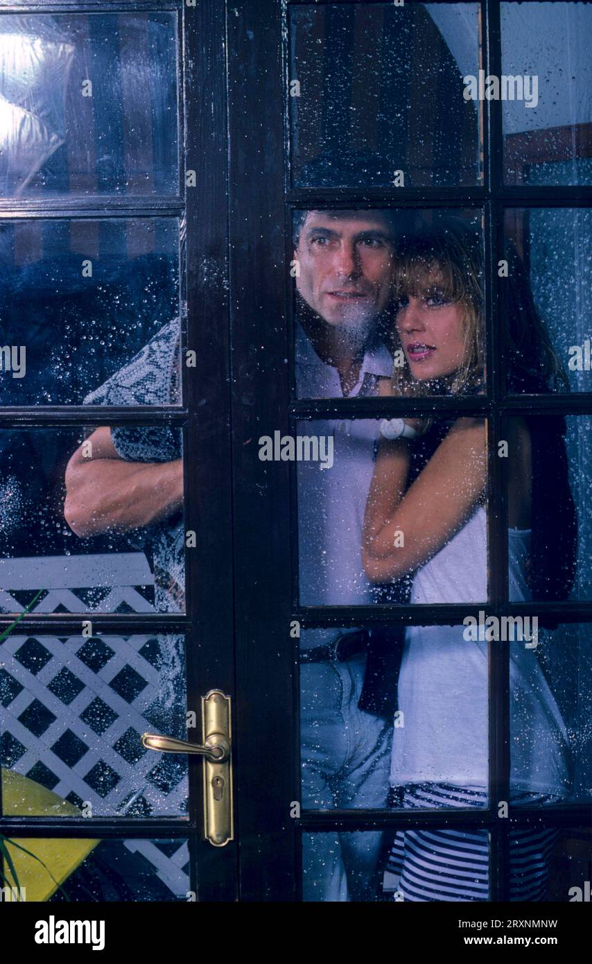 Rainy couple hi-res stock photography and images - Alamy