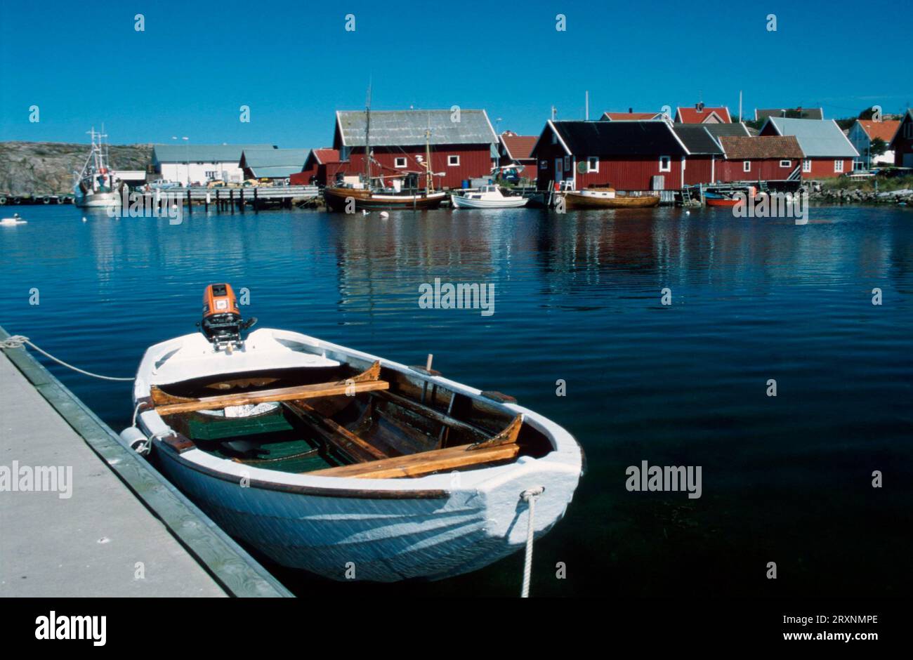 Boat and wooden houses at the harbour, Smogen, Sweden, Smoegen Stock ...