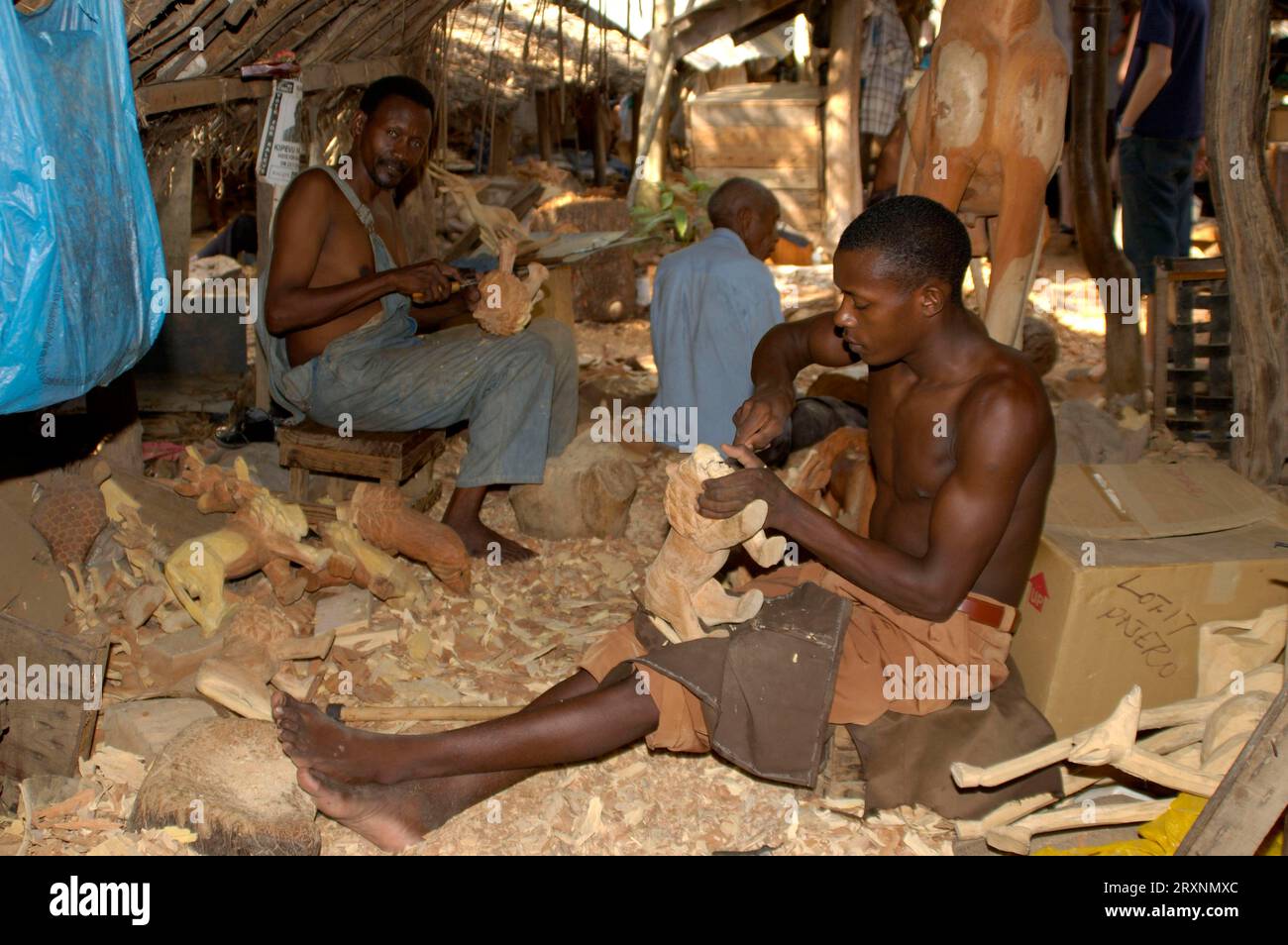 Wood carver at work, wood carving village, Kenya, carver, carving ...