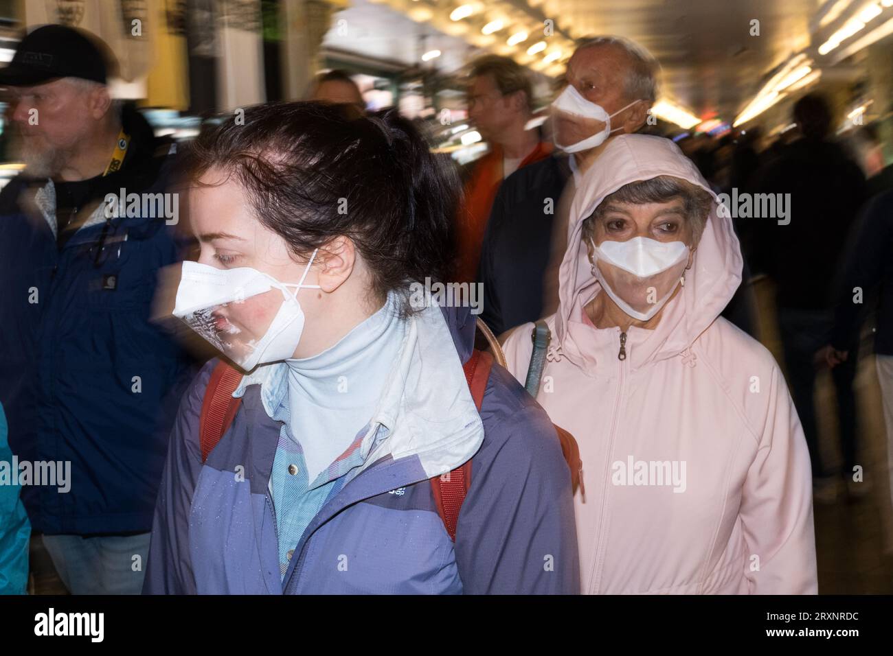 Seattle, USA. 25th Sep, 2023. People at Pike Place wearing masks during ...