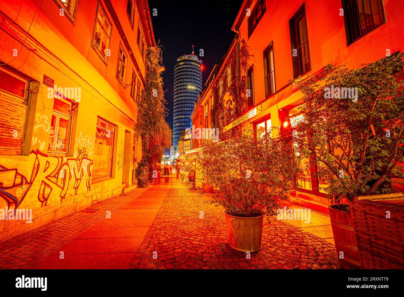 Restaurant and pub alleyway Wagnergasse in Jena at night with the ...