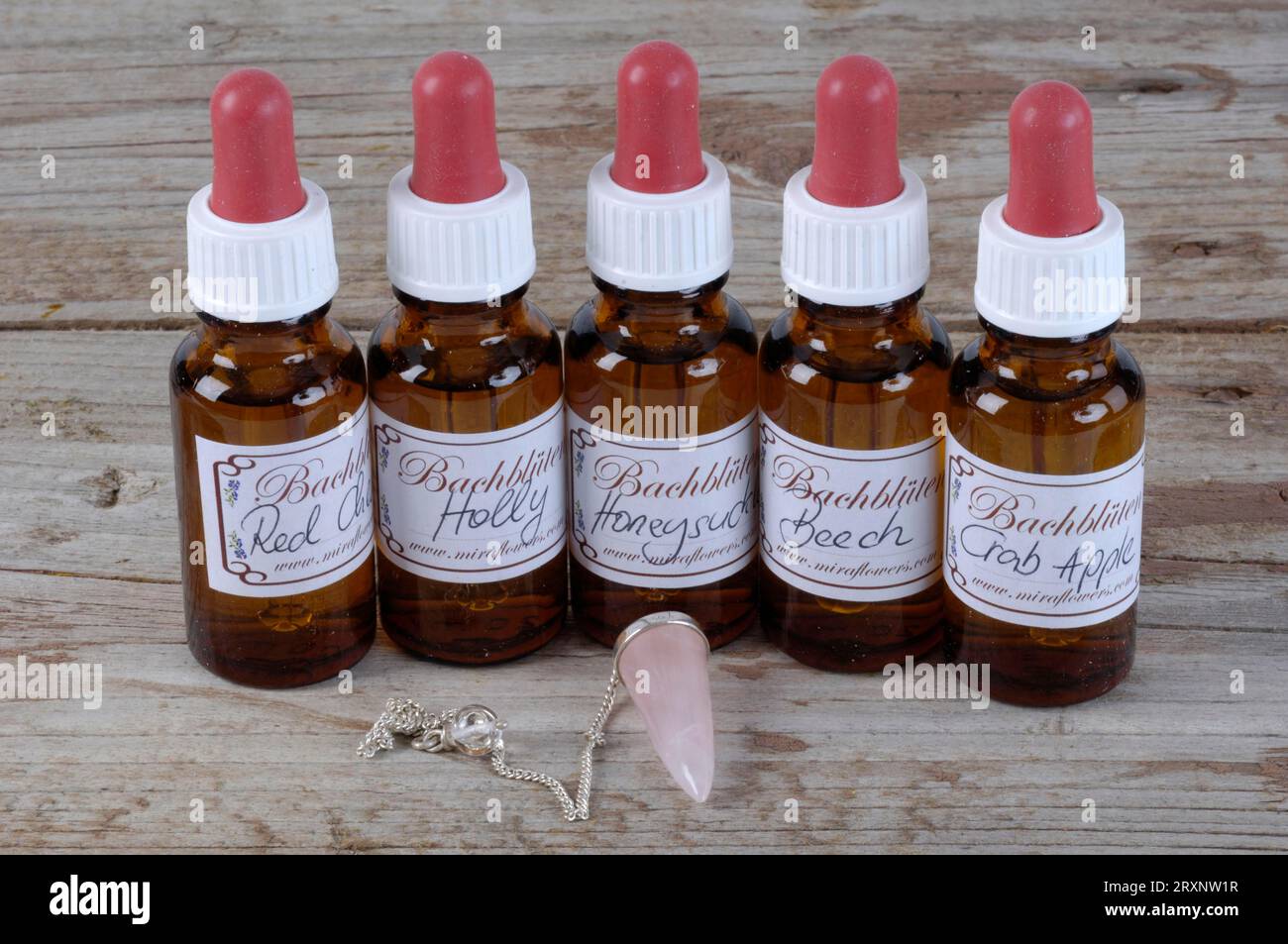 Bottles with different Bach blossoms and pendulum, vials with different ...