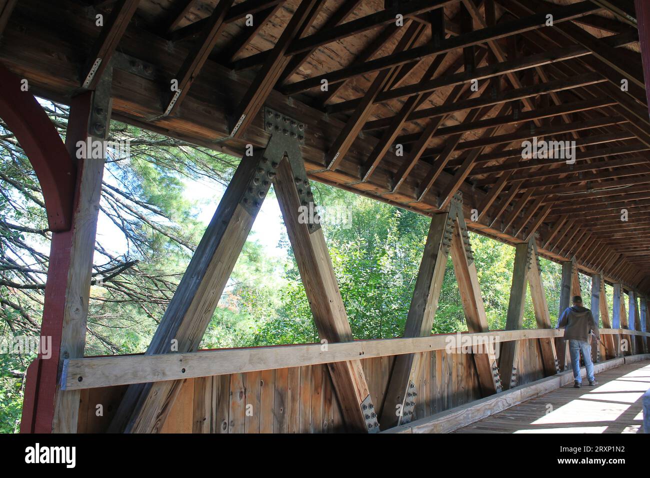 Covered Bridge (People Walking on a covered bridge Stock Photo - Alamy