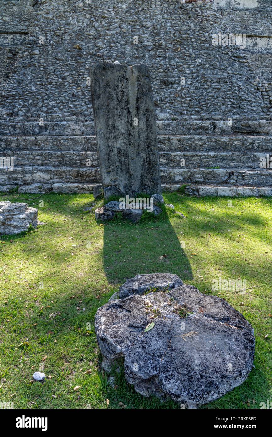 Stela and altar in front of Structure A-3 in the Mayan ruins in the ...