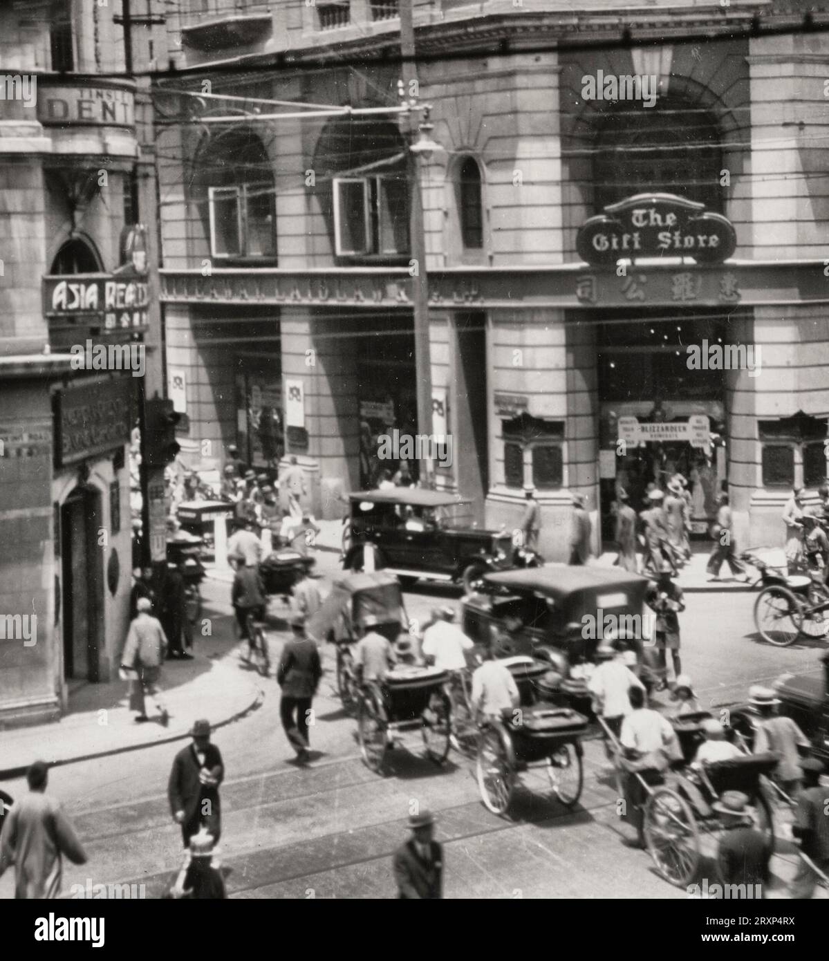 The busiest corner in Shanghai, Nanking and Scechuen Road, China, circa ...