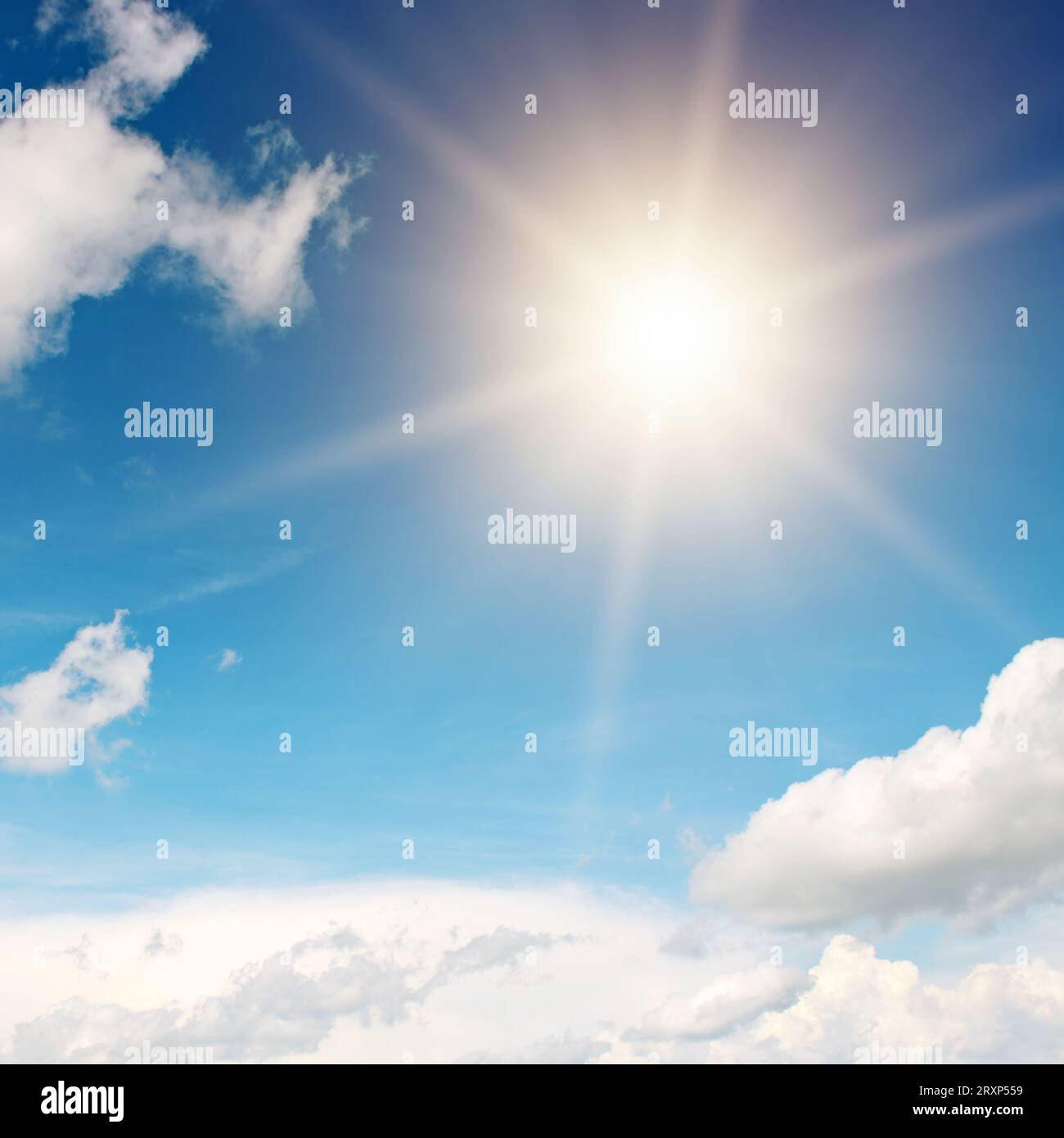 sun on beautiful blue sky Stock Photo - Alamy
