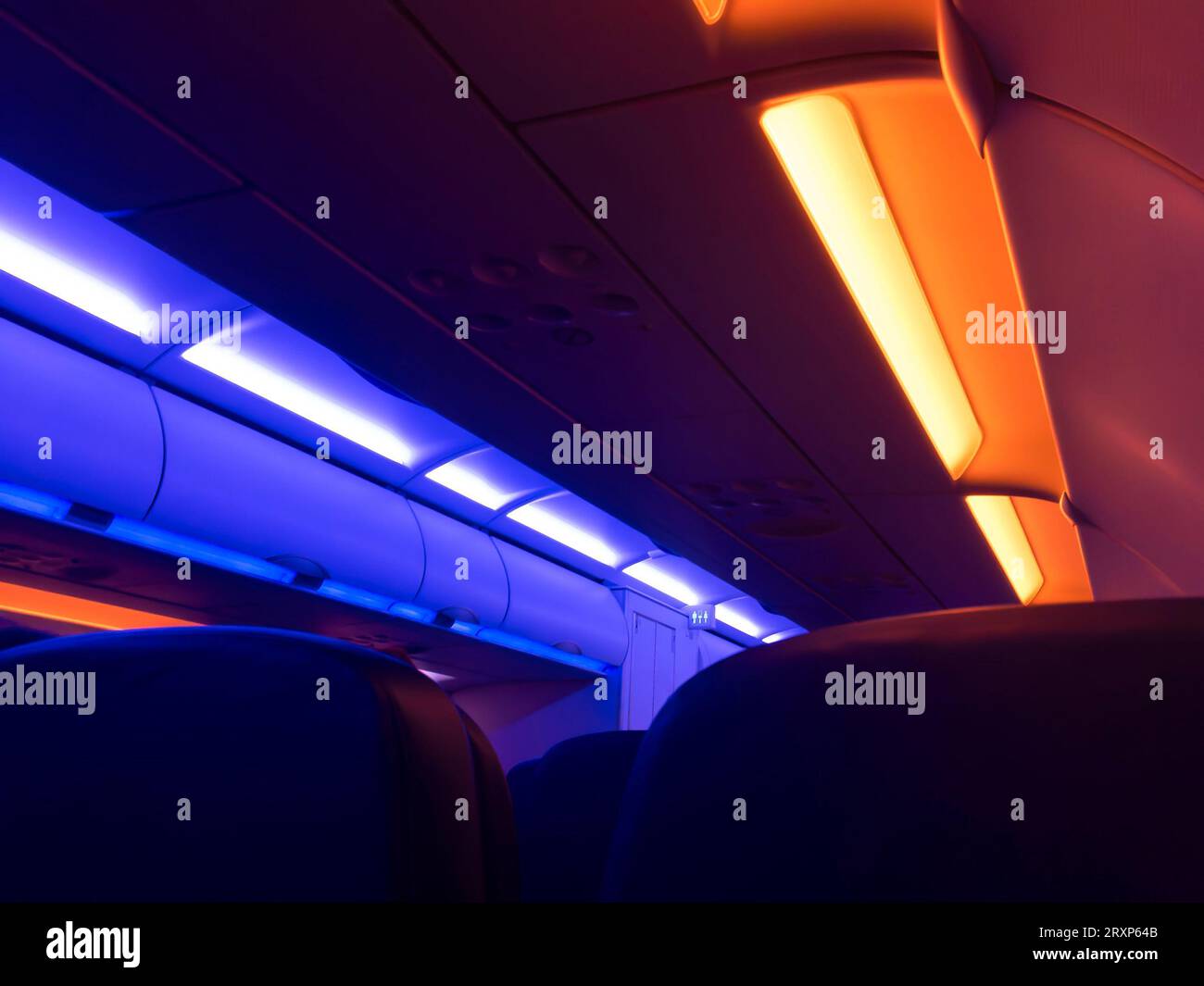 Interior of aircraft in night flying mode witl coloured lights Stock ...