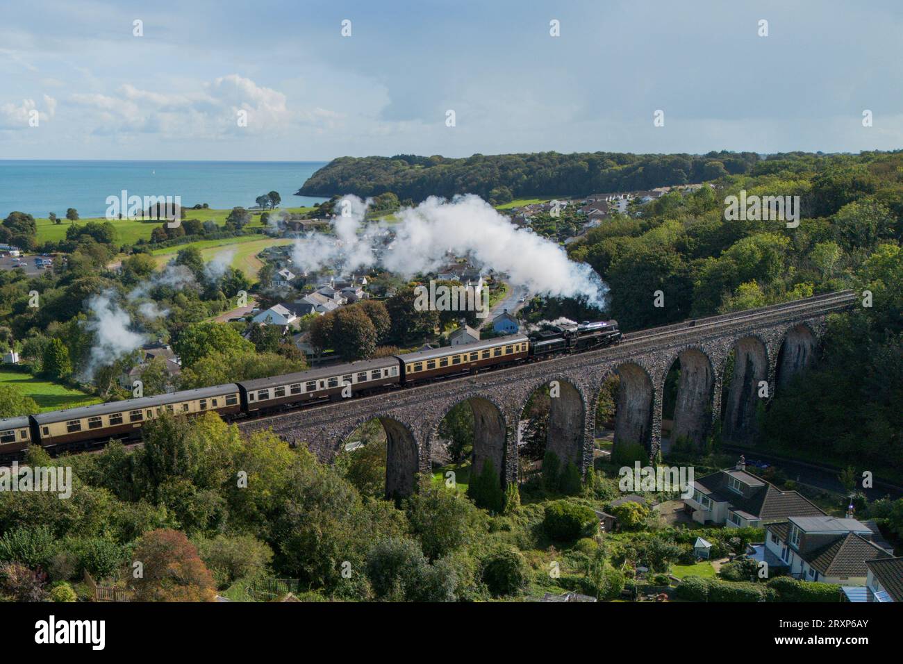 Aerial view of Dartmouth Steam Train on Hookhills Viaduct by the sea in ...