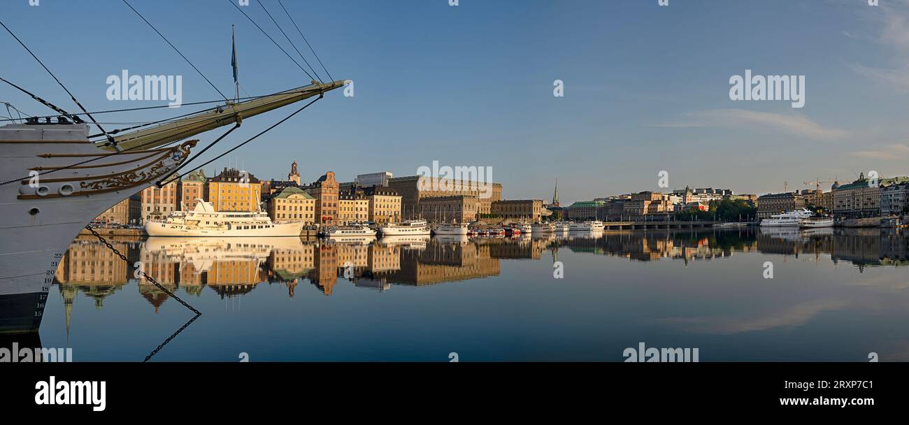 Long exposure of Lake Malaren reflecting surrounding buildings ...