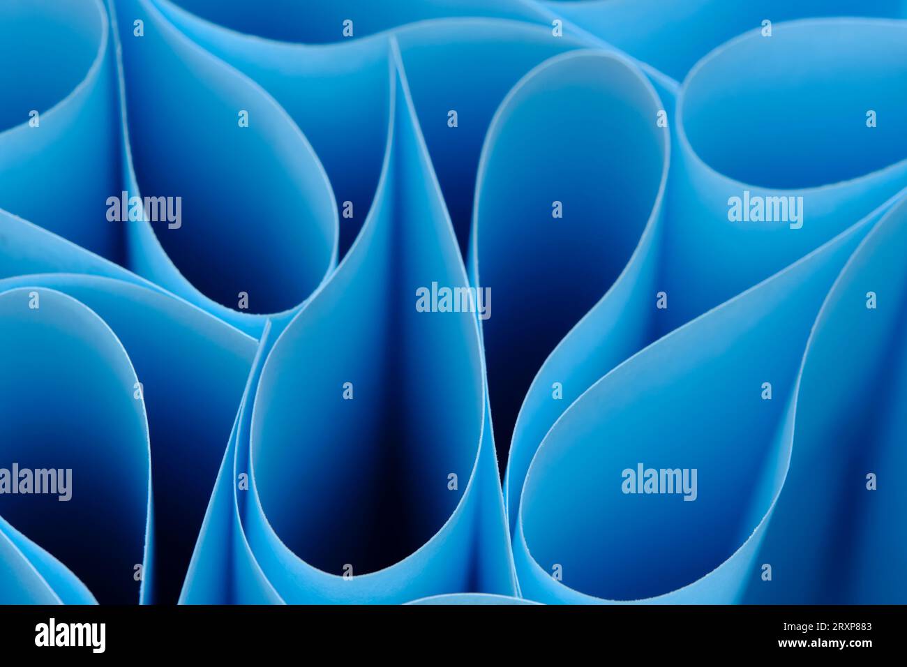 Abstract, blue paper background with smooth lines Stock Photo - Alamy