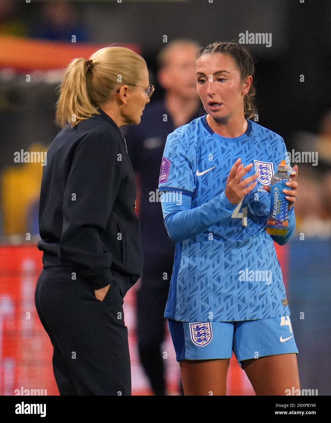 England head coach Sarina Wiegman and Katie Zelem on the touchline ...