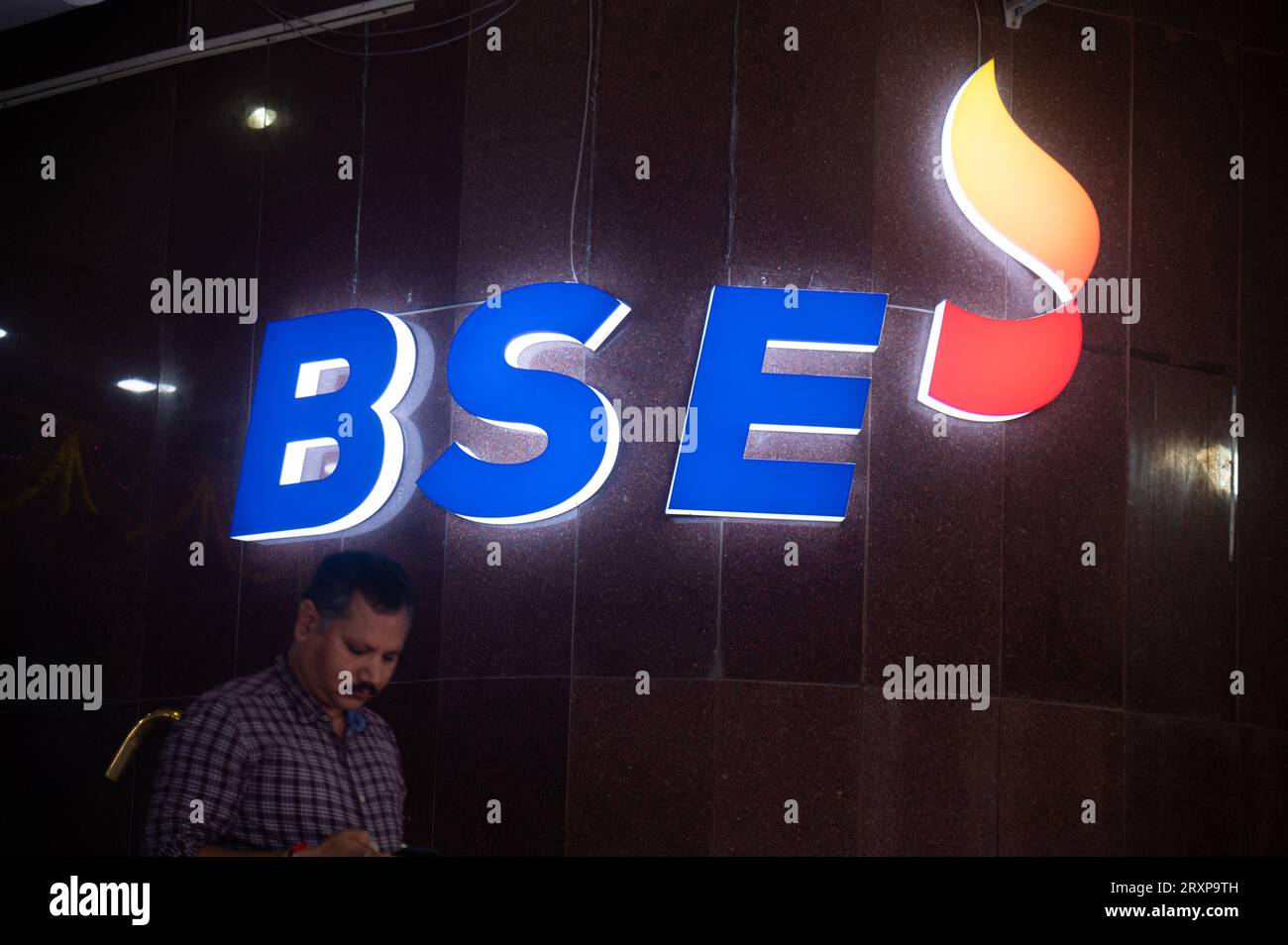 Mumbai, Maharashtra, India. 26th Sep, 2023. A man walks past the new ...