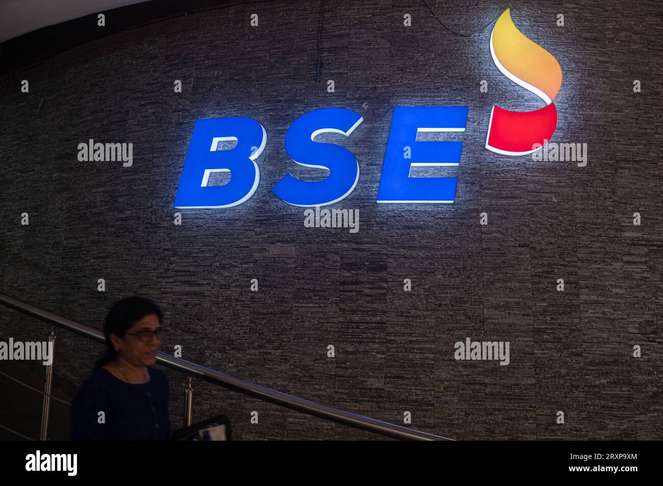 Mumbai, Maharashtra, India. 26th Sep, 2023. A woman walks past the new ...