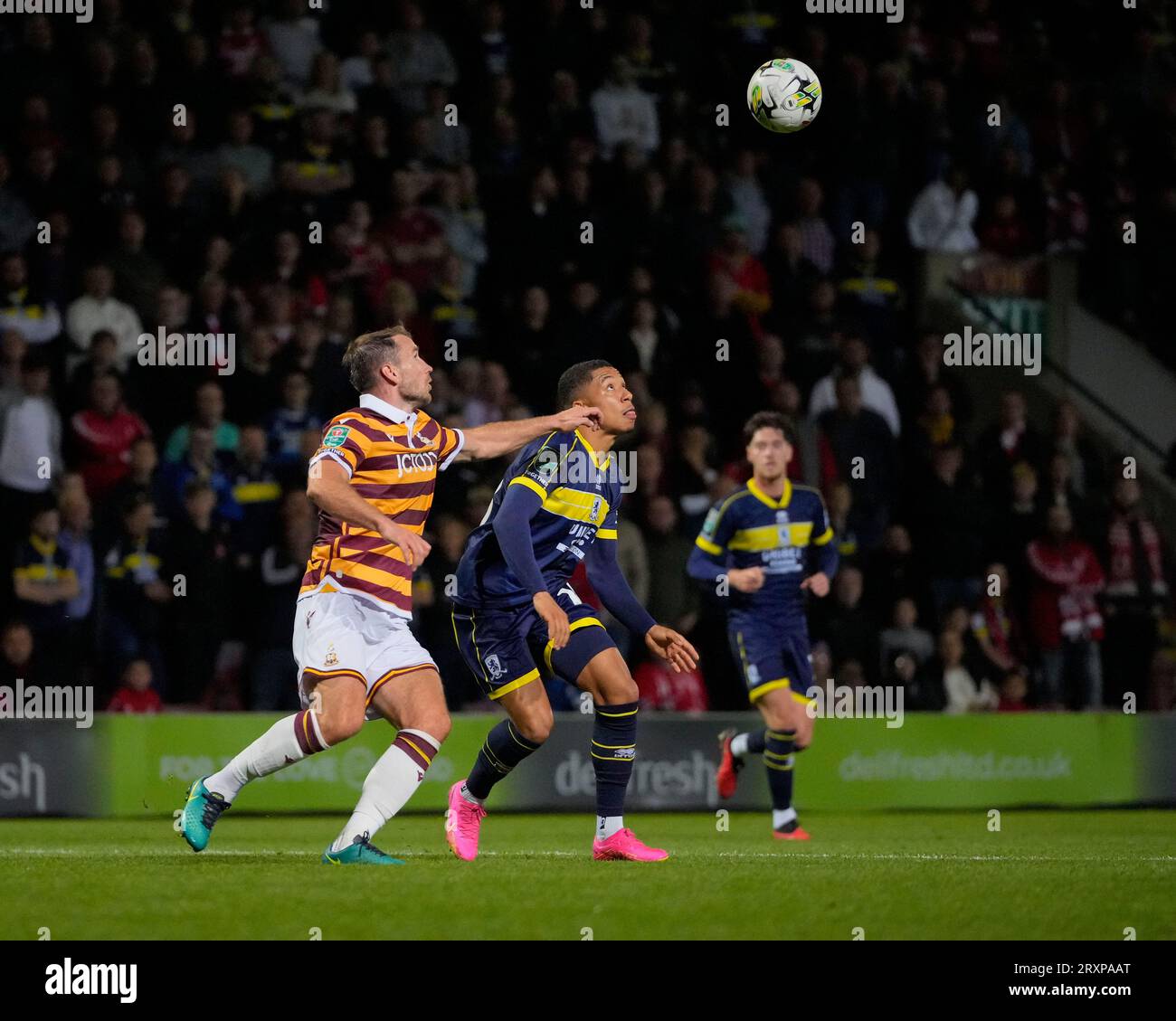 Liam Ridehalgh #3 of Bradford City competes for the ball with Samuel ...