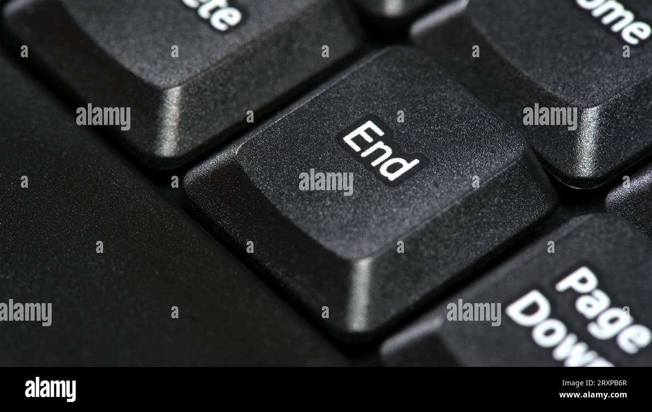 End key on a desktop PC office computer keyboard, the end button macro, detail, extreme closeup ...